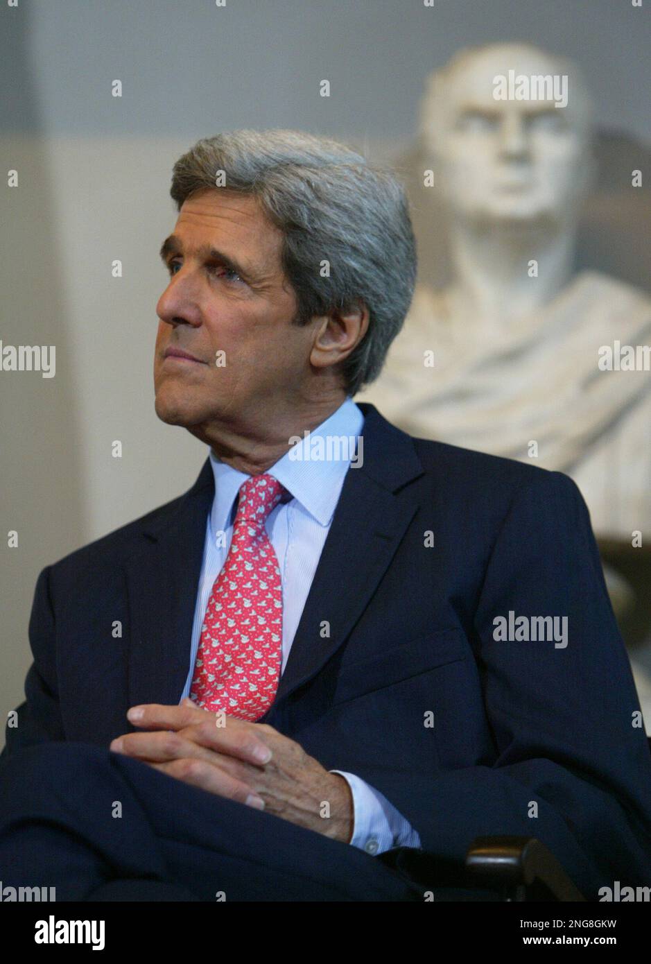 Sen. John Kerry, D-Mass., listens to speakers at Faneuil Hall, Monday ...