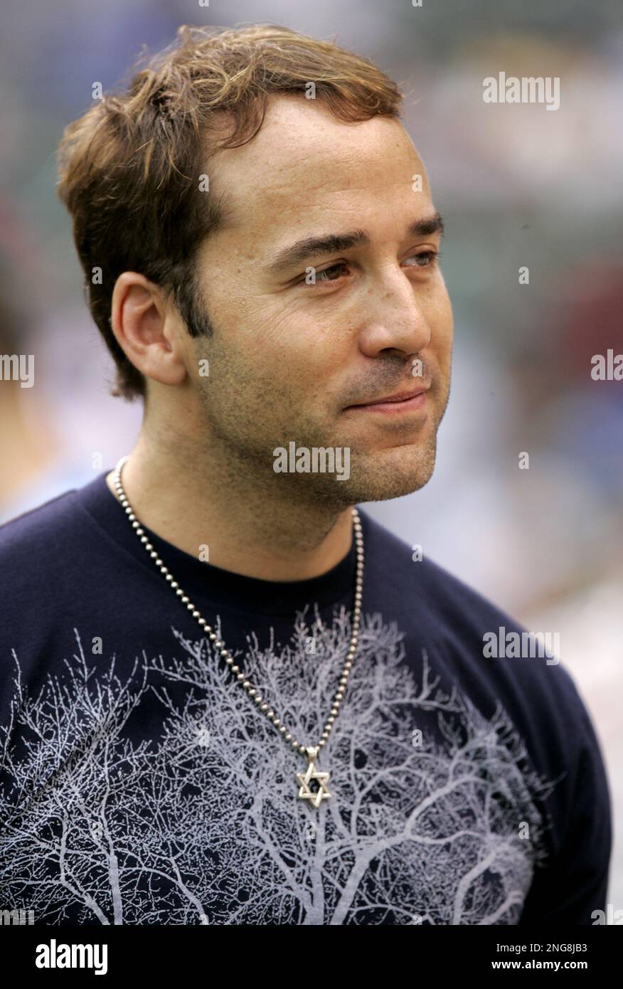 Actor Jeremy Piven prepares to throw out the first pitch before the ...