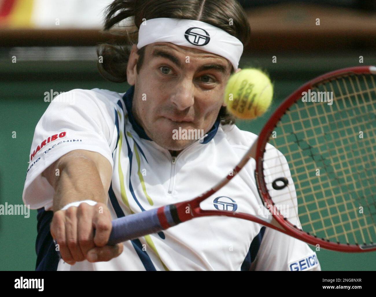 Spain's Tommy Robredo backhands to Croatia's Mario Ancic in their ...