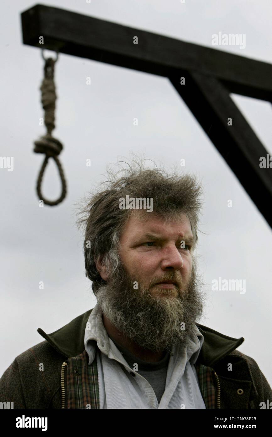 Briton David Lucas poses for pictures in front of one of the gallows he ...