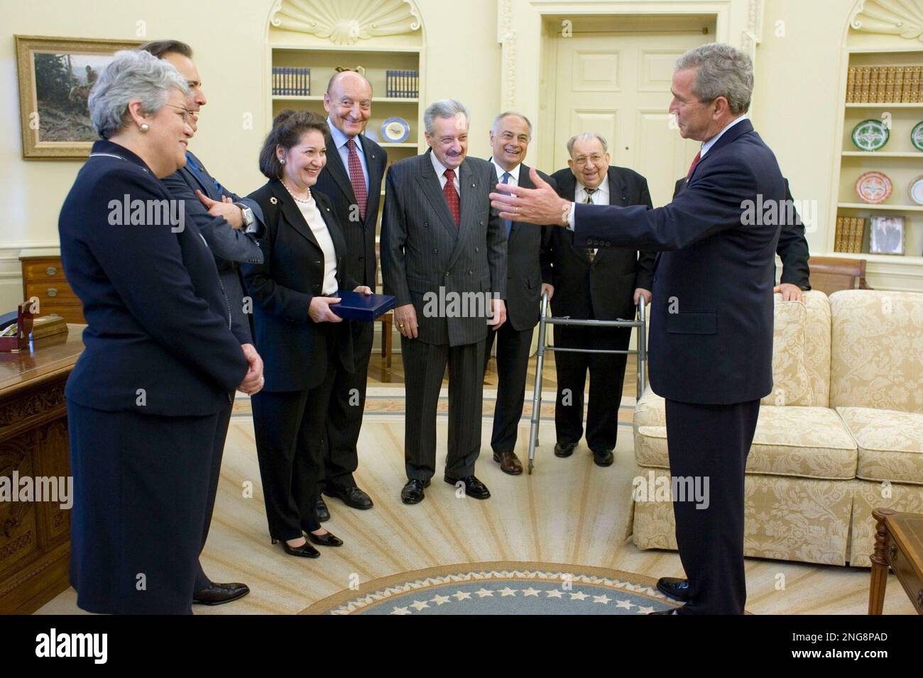 This photo released by the White House shows President Bush talking ...