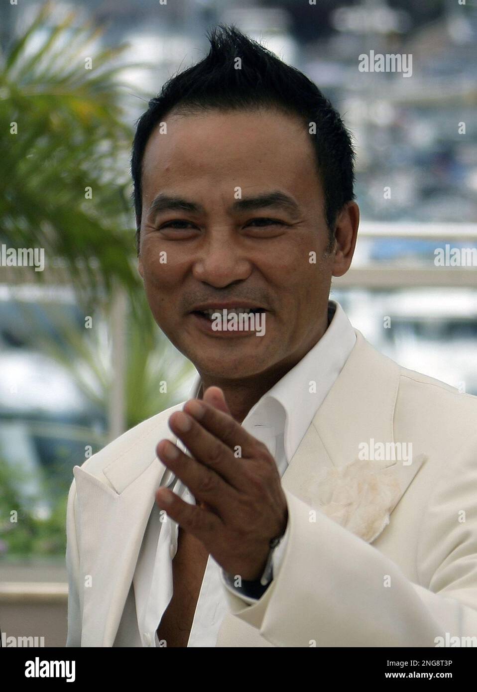 Chinese actor Simon Yam poses during a photo call for the film ...