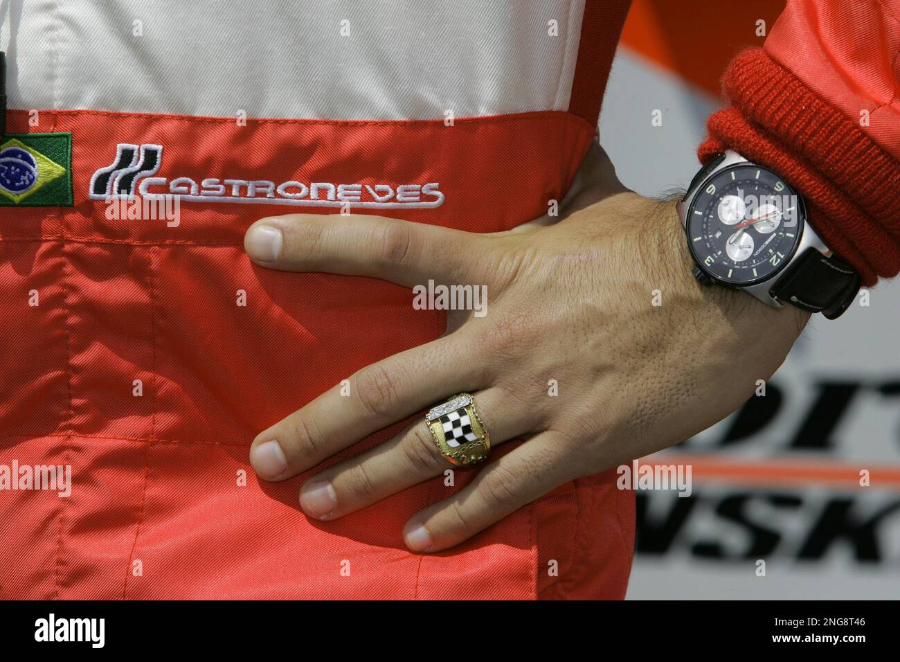Two-time Indy 500 winner Helio Castroneves stands in the pits on ...