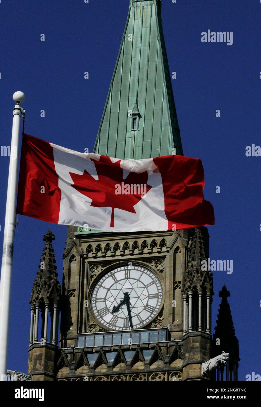 The clock on the Peace Tower of the Parliament Buildings in Ottawa is ...