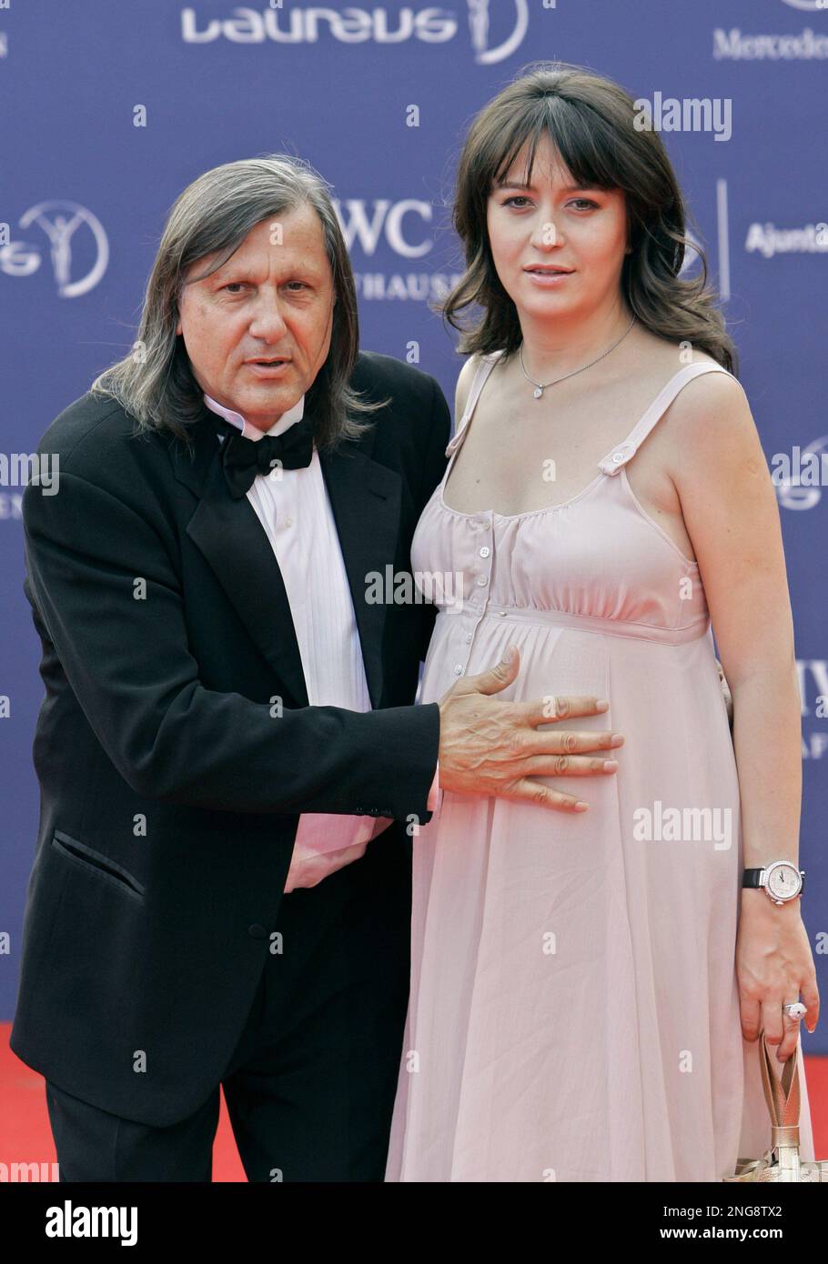 Romanian tennis legend Ilie Nastase, left, and his wife Amalia poses ...