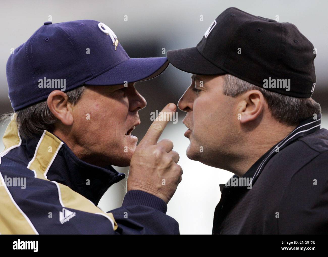 Milwaukee Brewers manager Ned Yost, left, argues with homeplate umpire ...