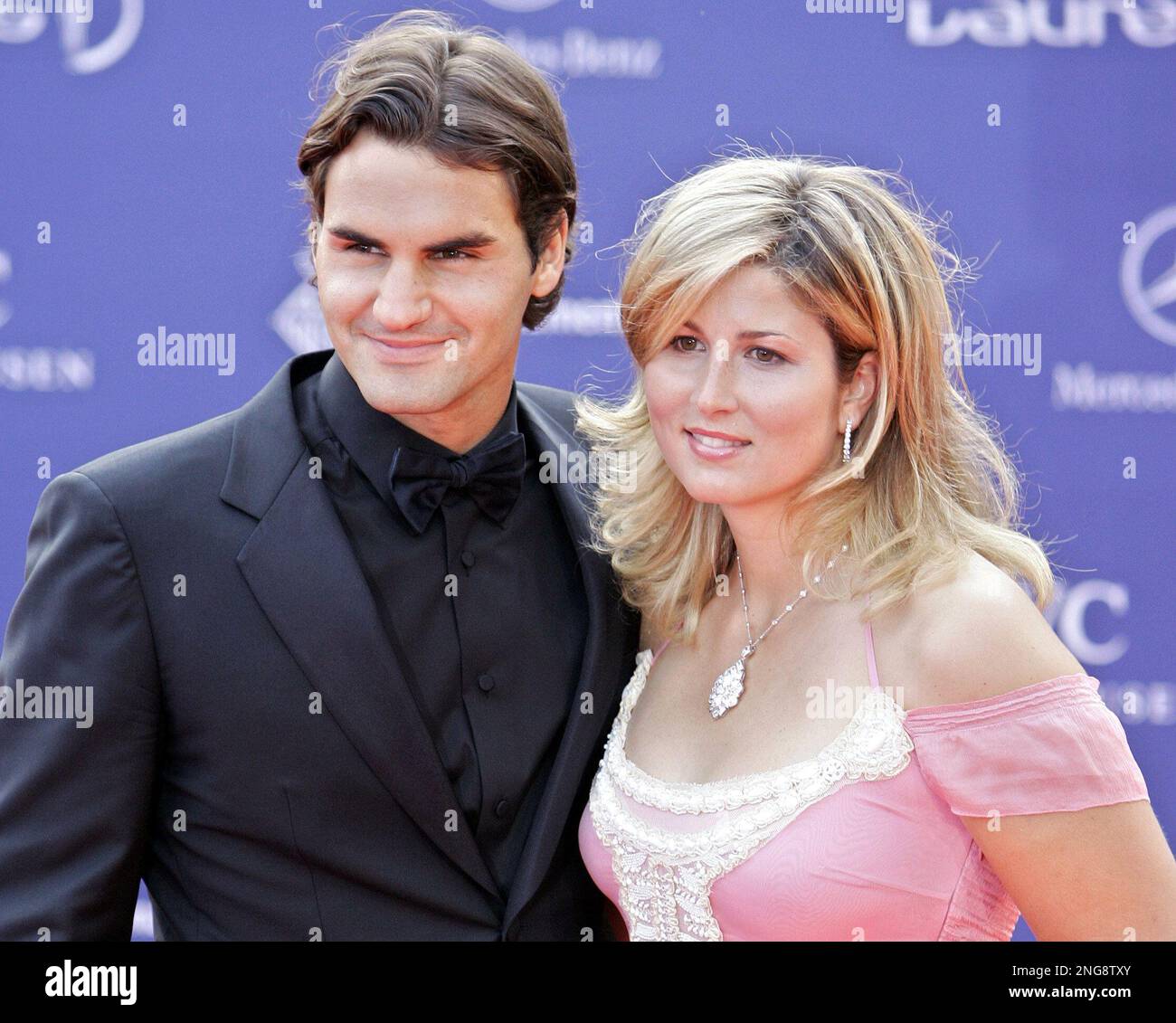 Swiss tennis player Roger Federer and his partner Mirka pose for ...