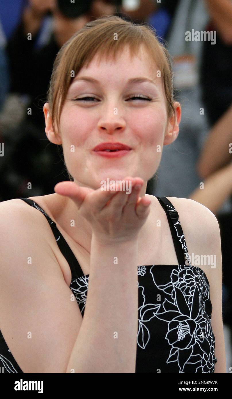 French actress Adelaide Leroux blows a kiss during a photo call for the ...