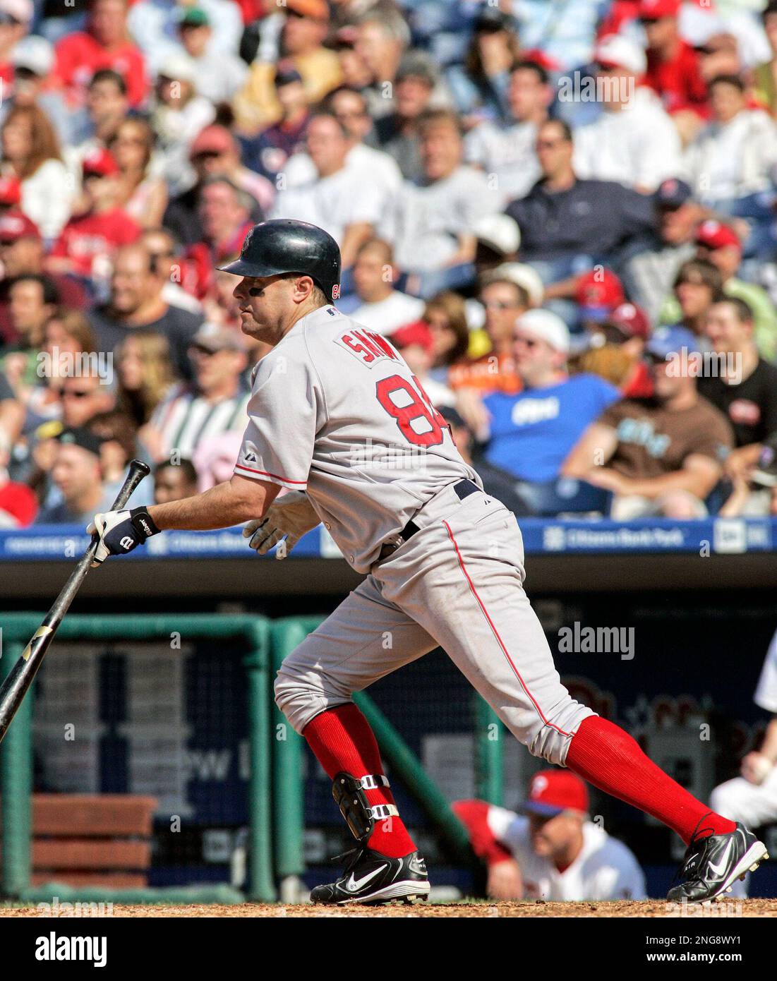 Boston Red Sox' J.T. Snow knocks in Mike Lowell with a single against the Philadelphia Phillies ...