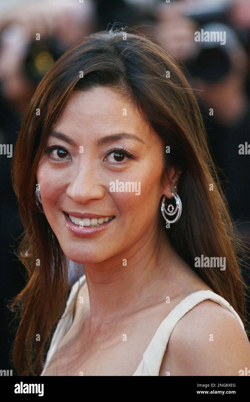 Actress Michelle Yeoh arrives for the screening of the film "Volver ...