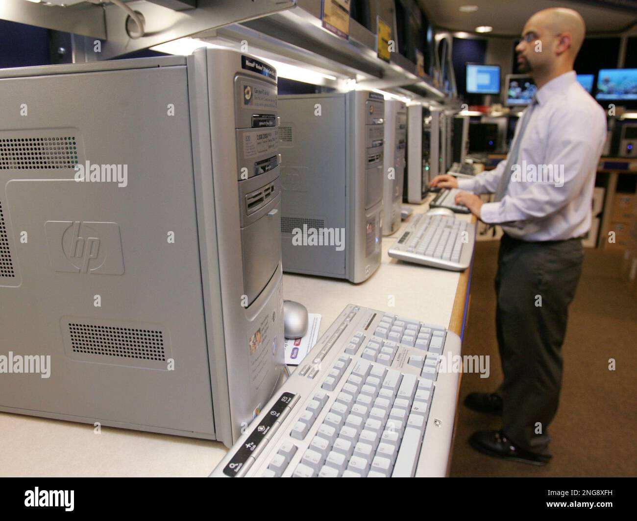 Hewlett-Packard and Compaq computers on display at Micro Center ...