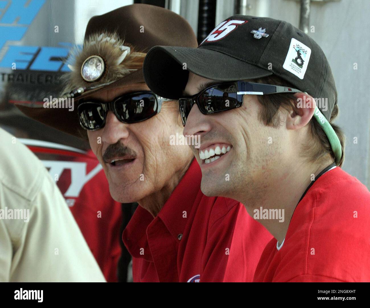 Richard Petty, left, and his grandson Austin Petty, right, talk in the ...
