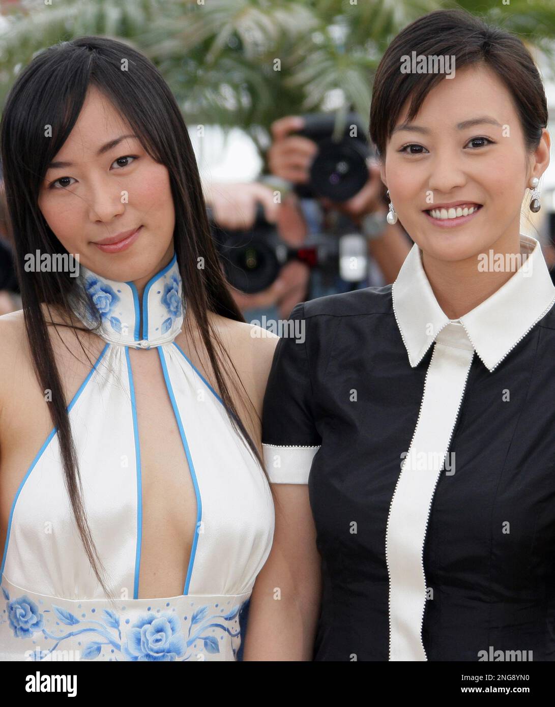 Chinese actress Hao Lei, right, poses with actress Hu Ling Ling during ...