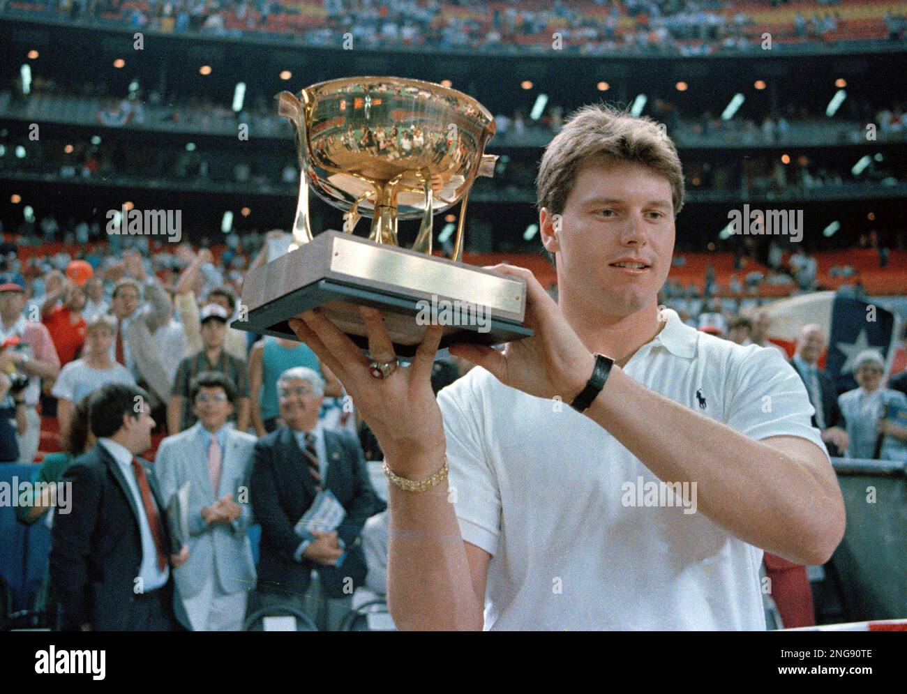 Boston Red Sox pitcher Roger Clemens holds up the Most Valuable Plaer ...
