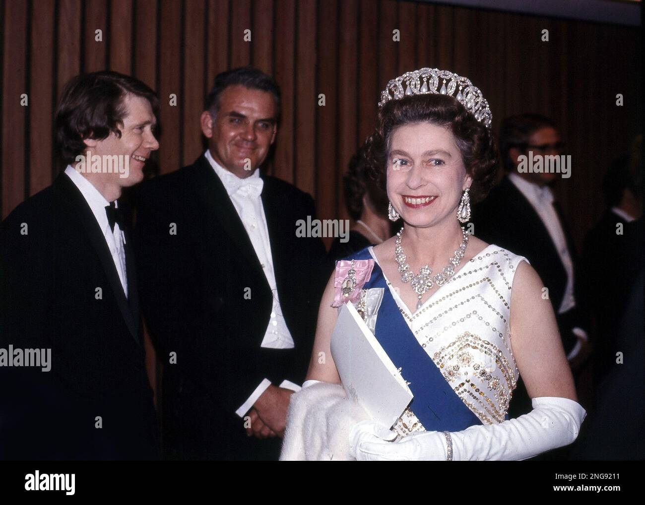 Britain's Queen Elizabeth II enters the newly opened Sydney Opera House ...