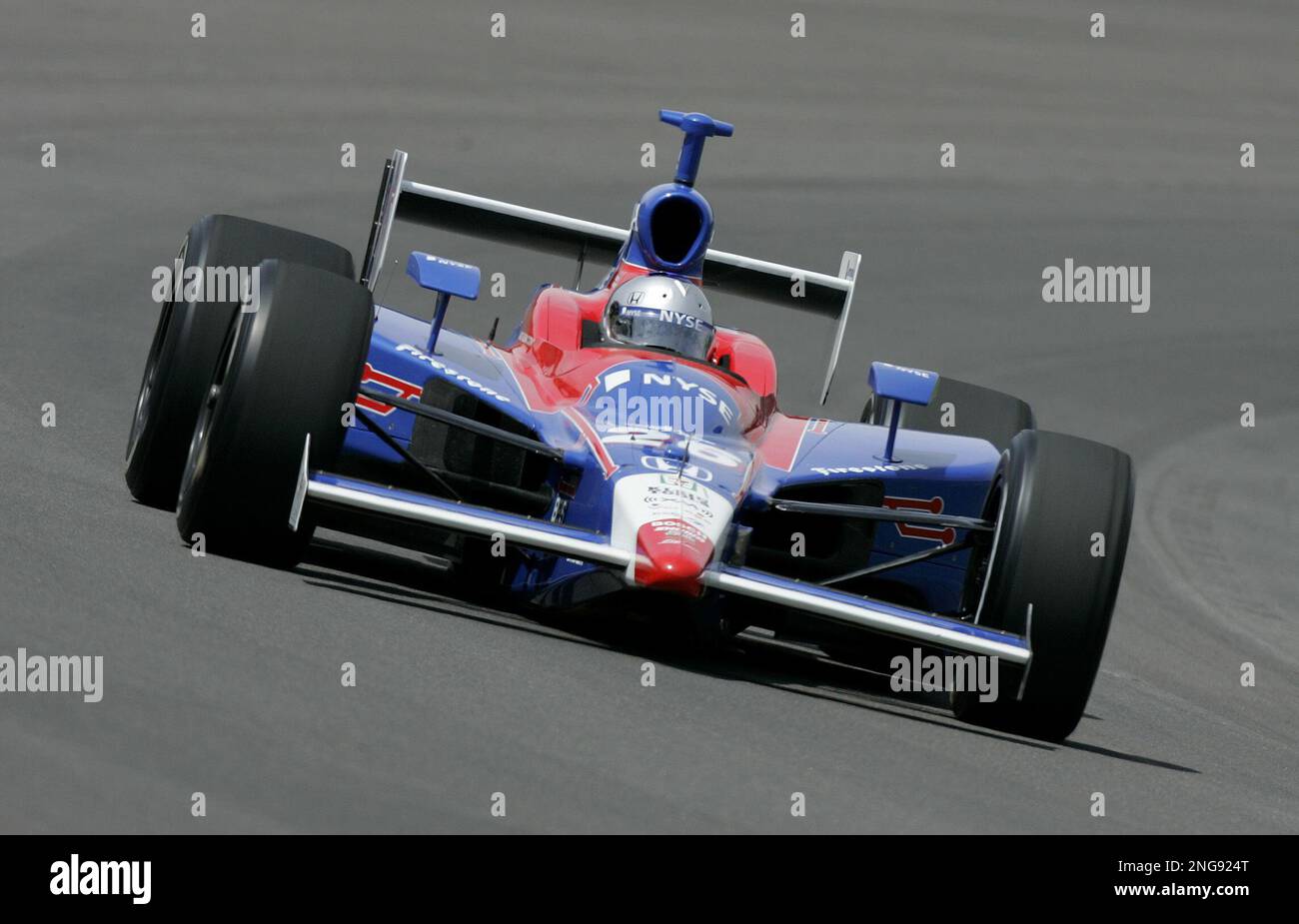 Indy Racing League driver Marco Andretti speeds through the first turn ...