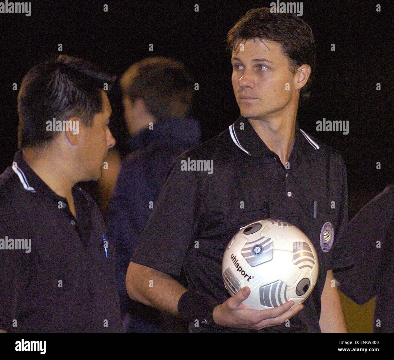 Australian World Cup football referee Mark Shield, centre, in Brisbane ...