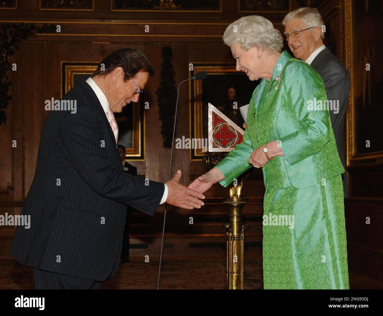 Queen Elizabeth II with Help The Aged Living Legend award winner, Sir ...