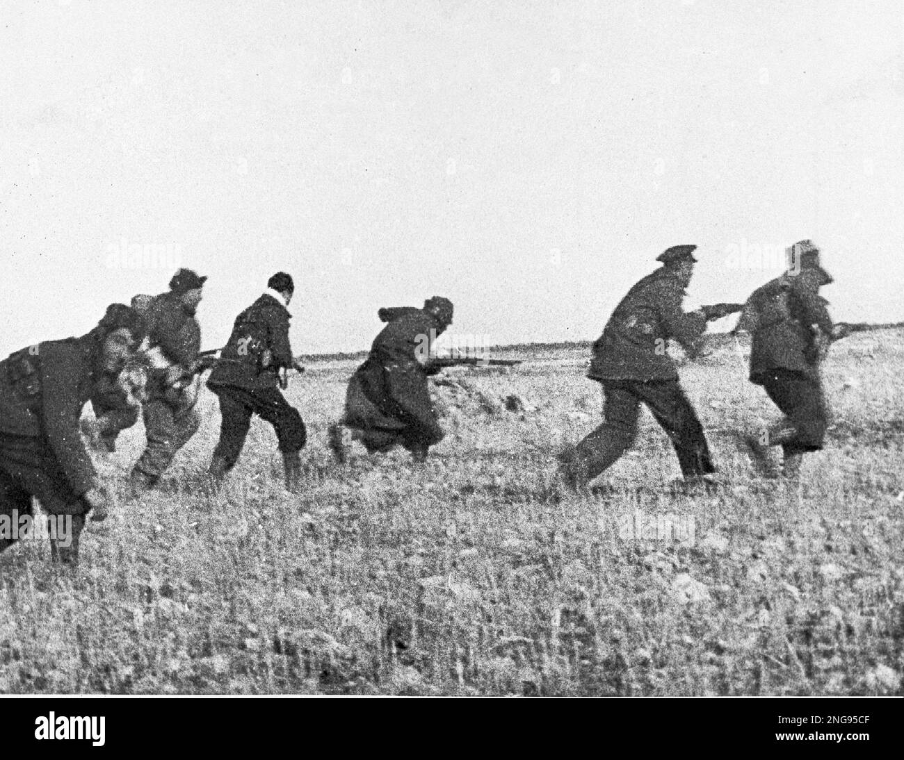 Spanish insurgent forces, carrying long rifles, make their way in the ...