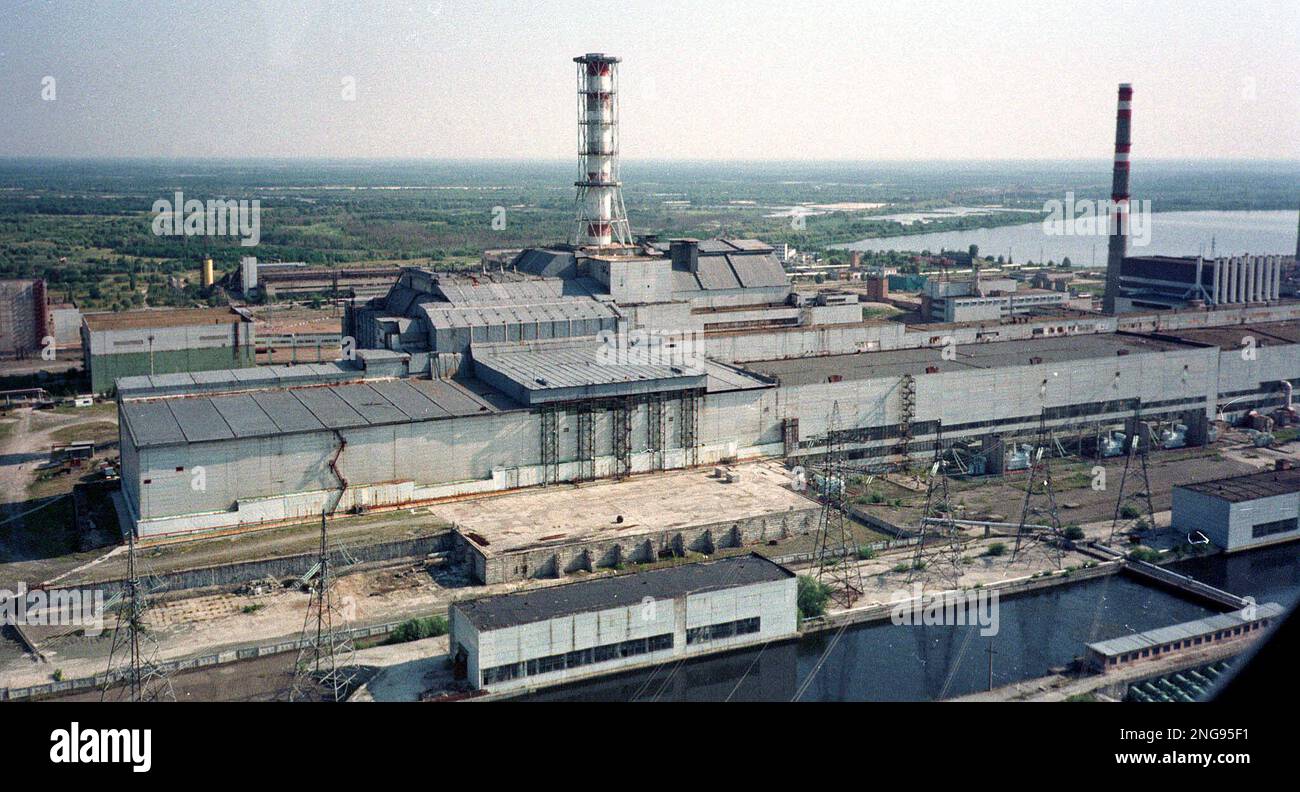 ** FILE ** A chimney towers over the sarcophagus that covers destroyed ...