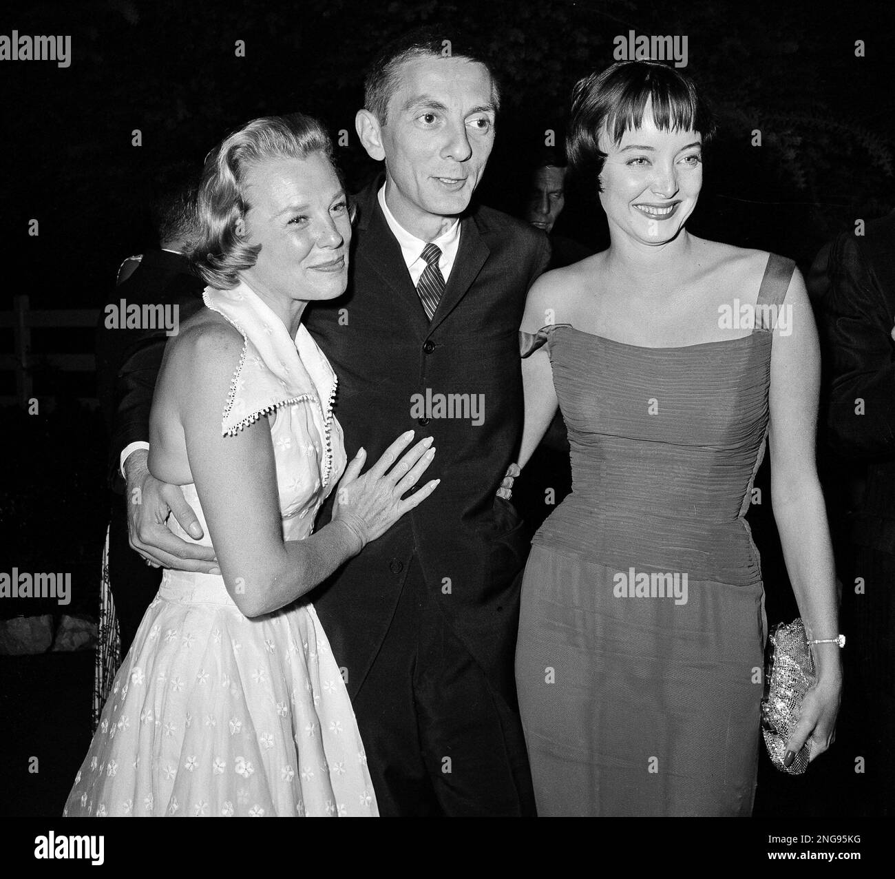 June Allyson, left, writer Aaron Spelling, center and his actress wife ...