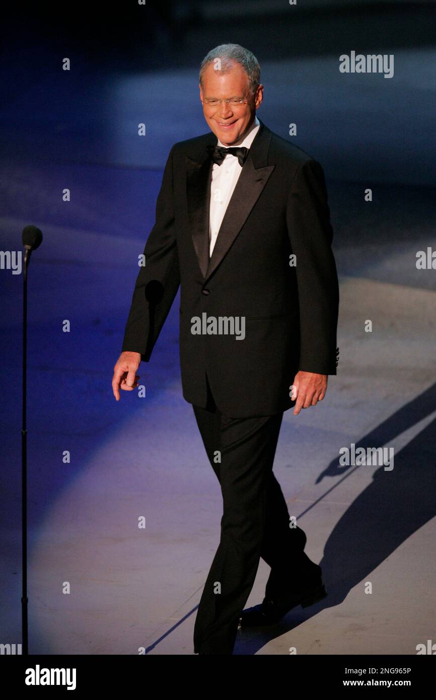Late night talk show host David Letterman walks on stage for a surprise ...