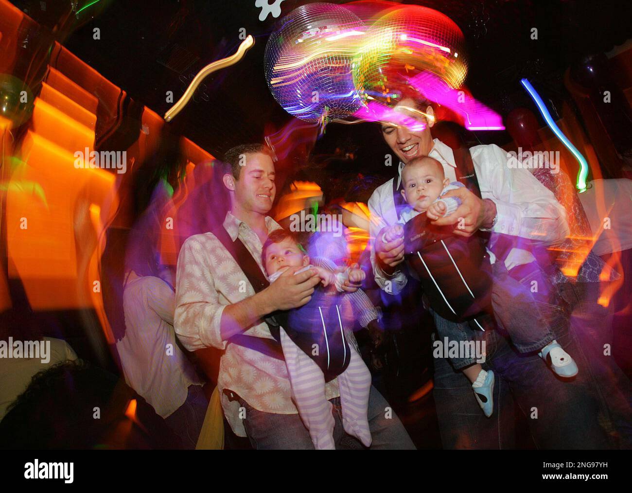 Justin Simpson, left, and his four month old daughter Georgia, dance ...