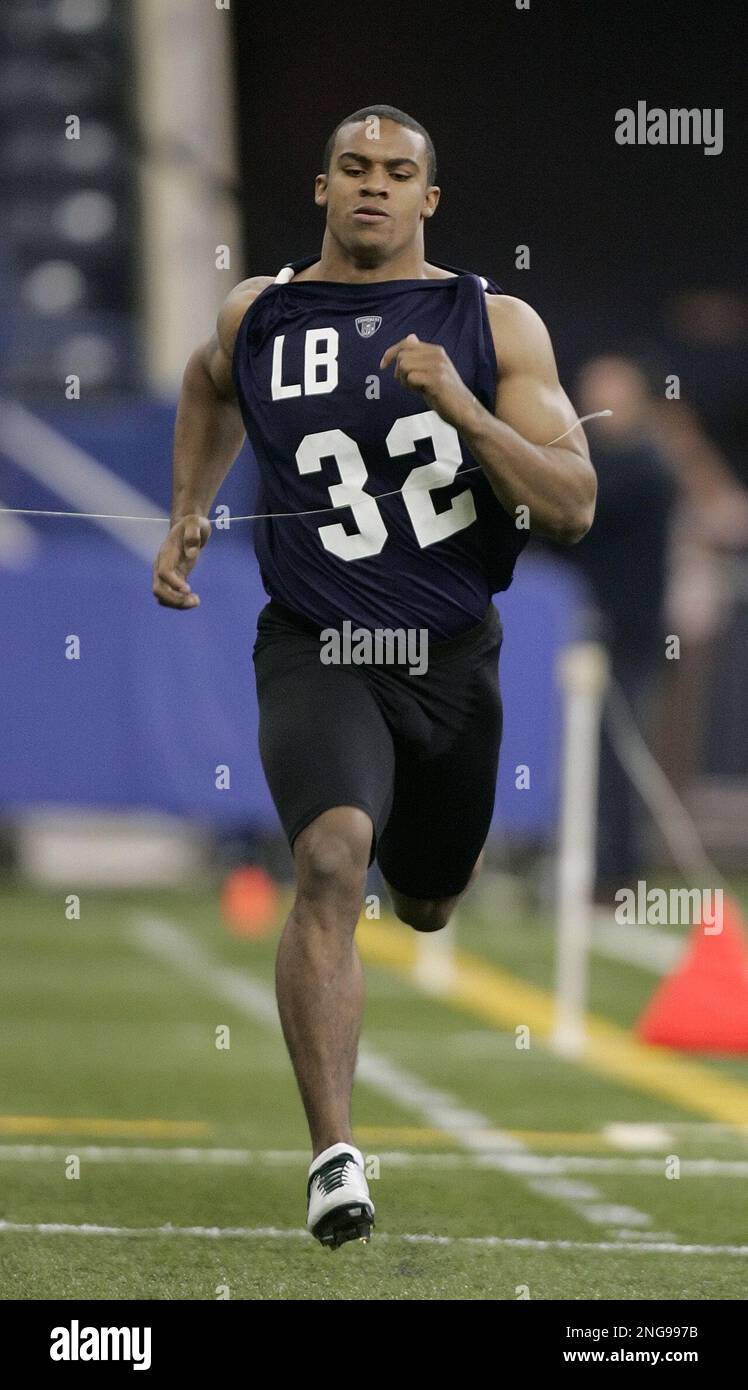 Anthony Trucks of Oregon crosses the finish line in the 40-yard dash ...