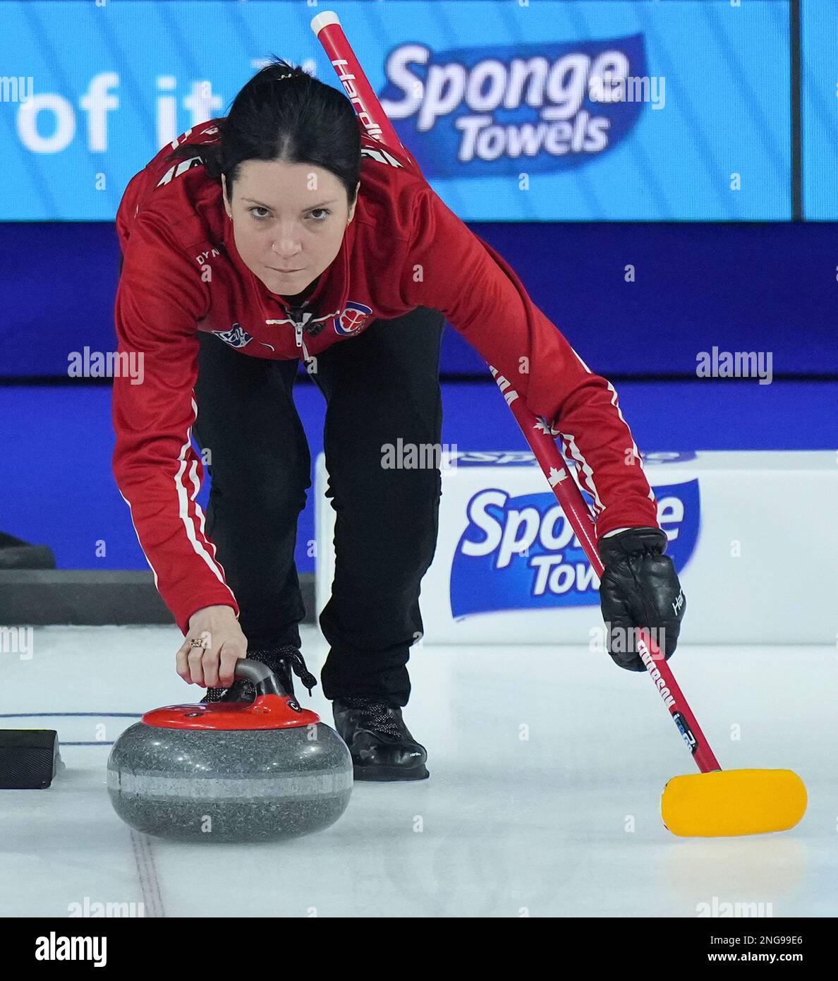 Team Canada skip Kerri Einarson delivers a rock while playing against ...