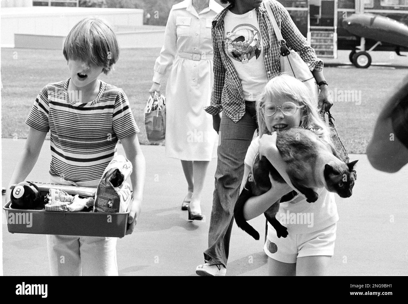 President Carter's daughter Amy Carter holds her cat Misty as she ...