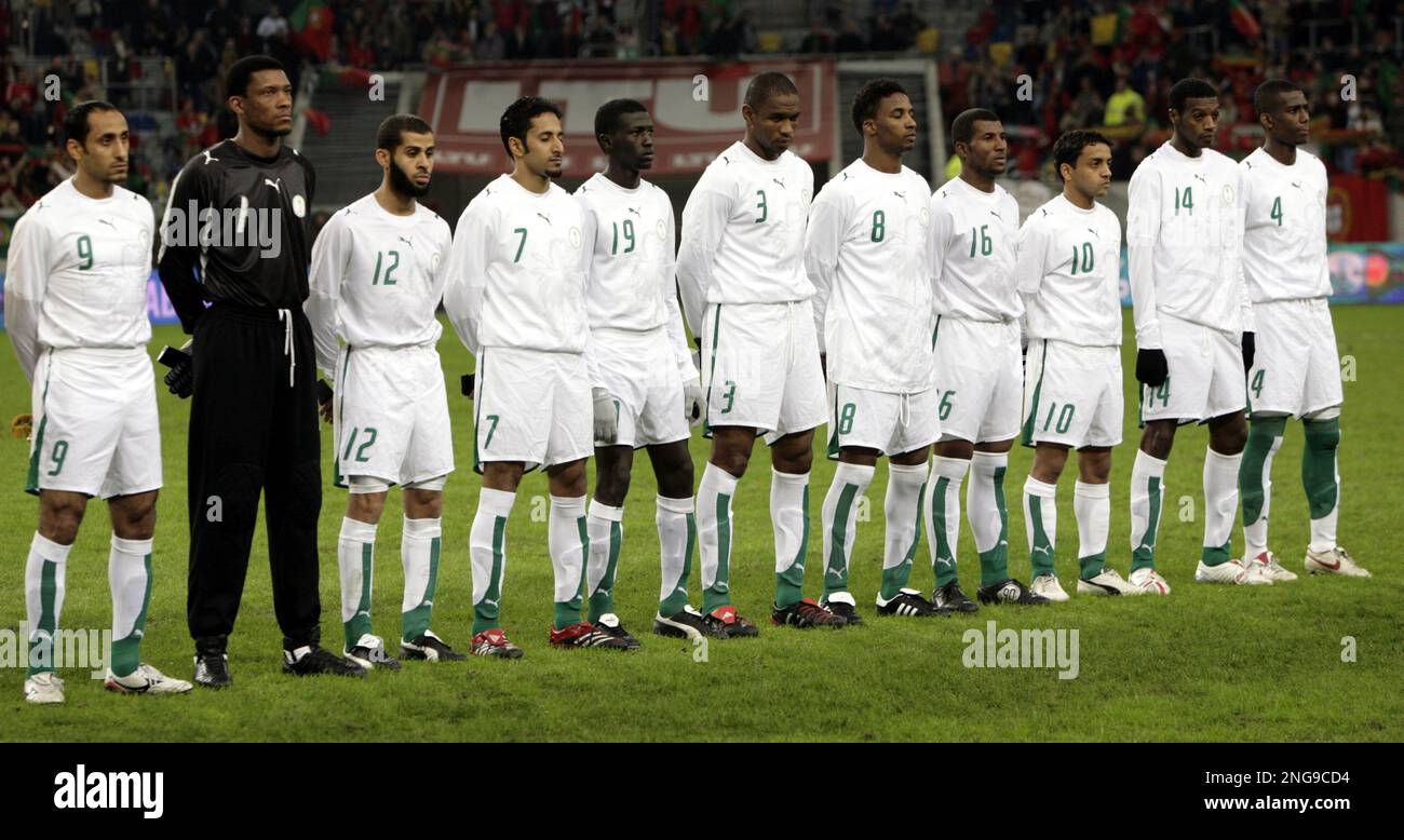 Saudi Arabia's national soccer team listen to the national anthem ...