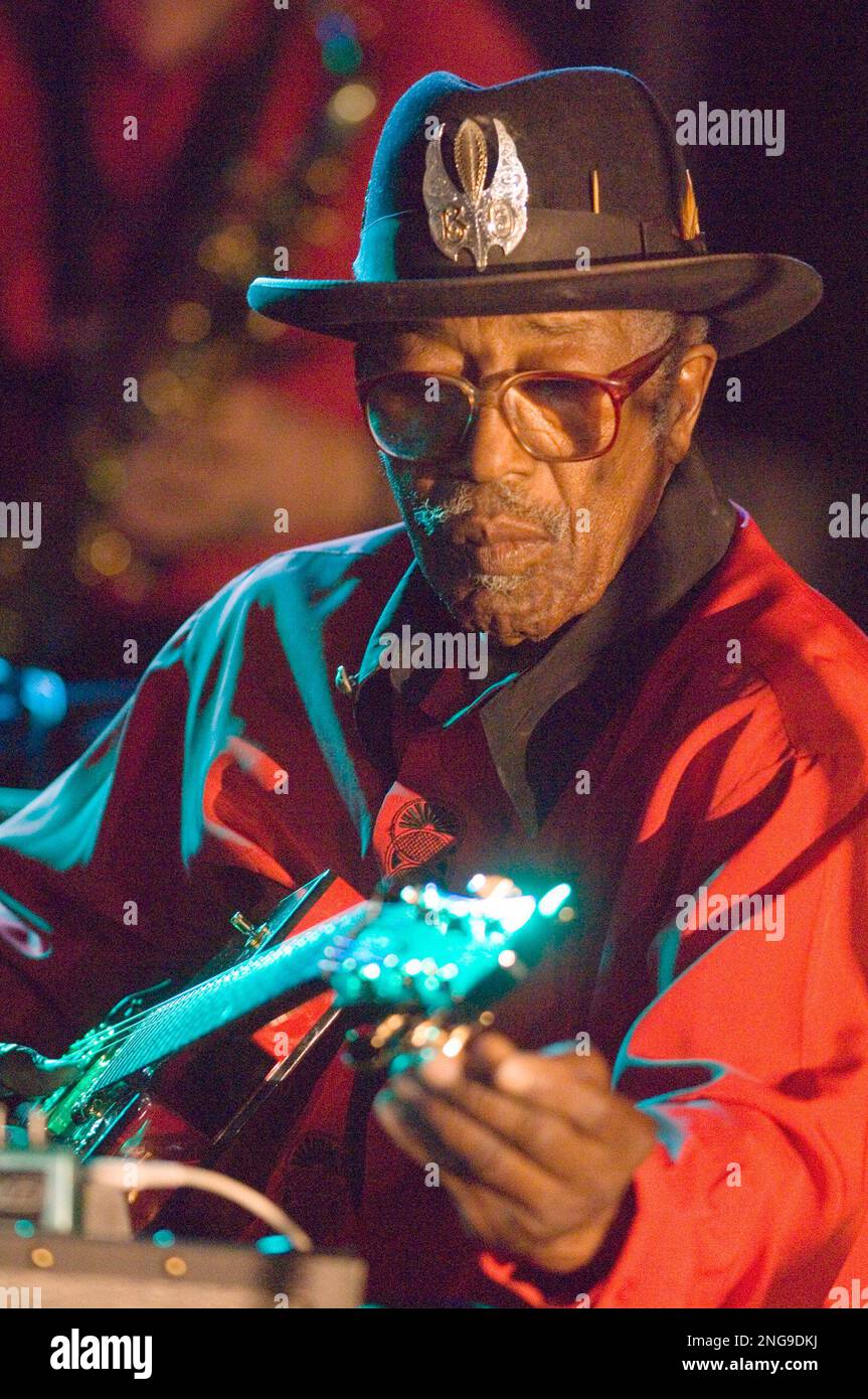 Ellas McDaniel, better known as Bo Diddley, tunes his guitar at a ...