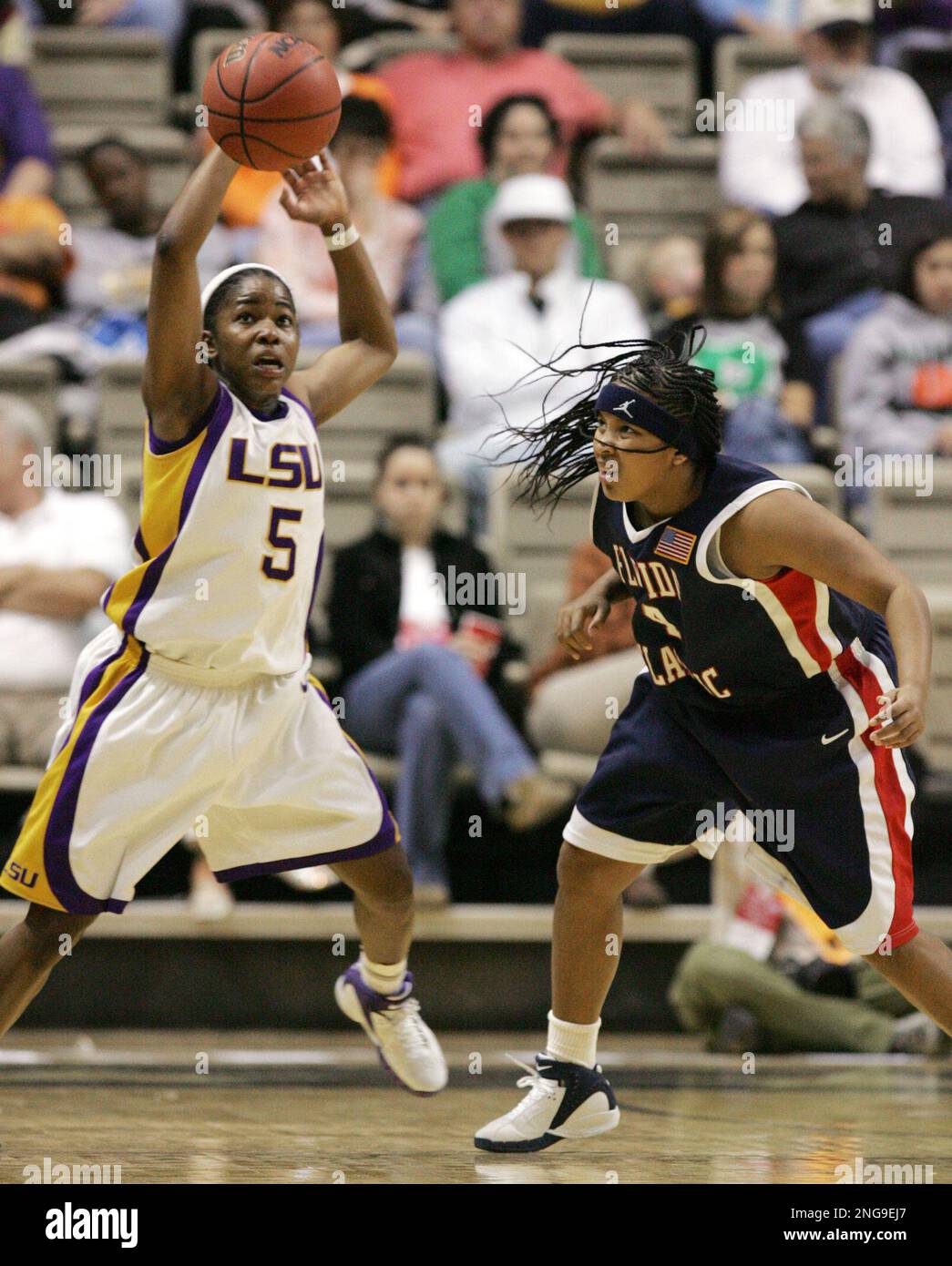 Louisiana State's Erica White grabs a loose a ball as Florida Atlantic ...