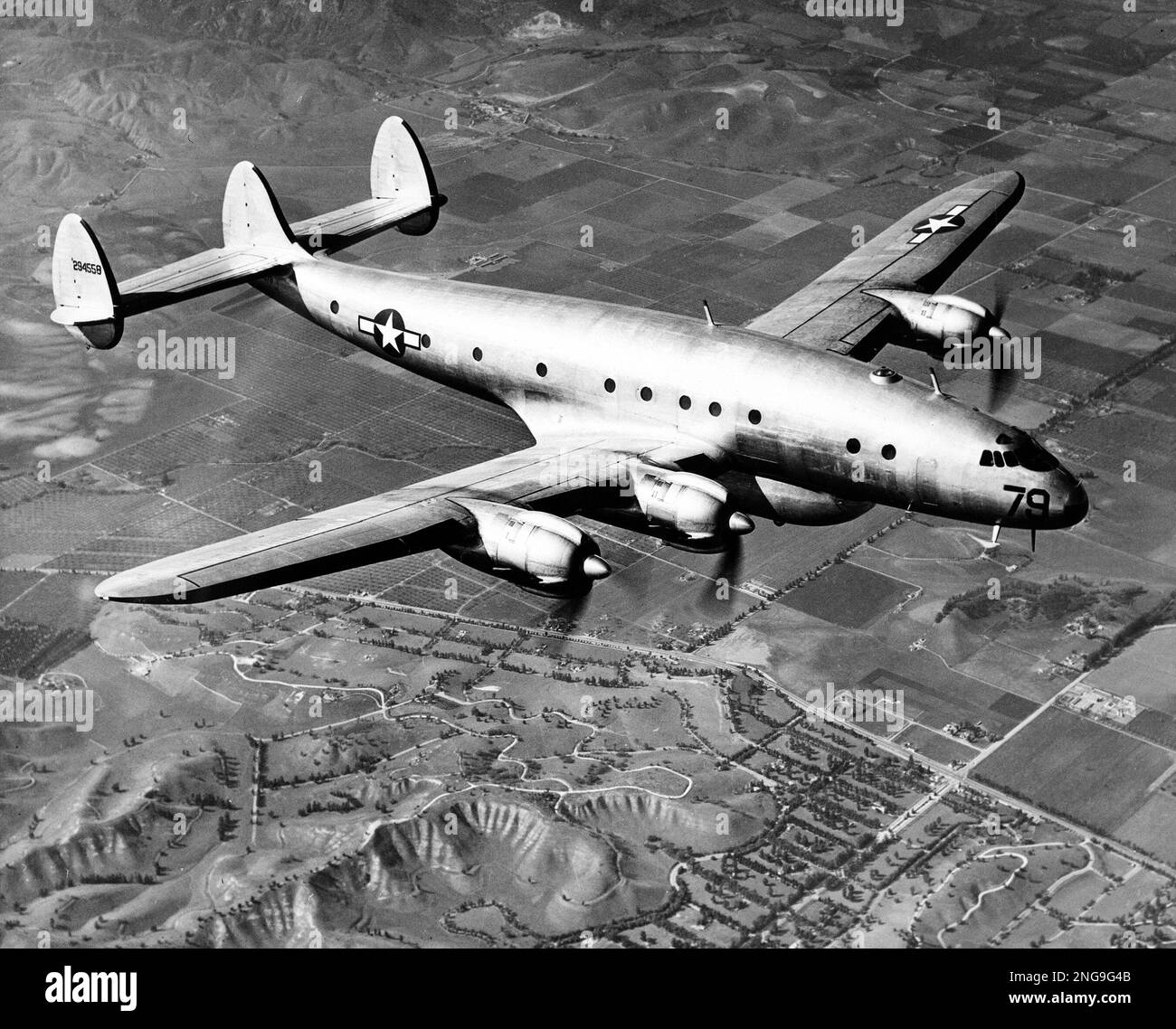 A Lockheed Constellation cargo plane is seen in flight, 1946, location ...