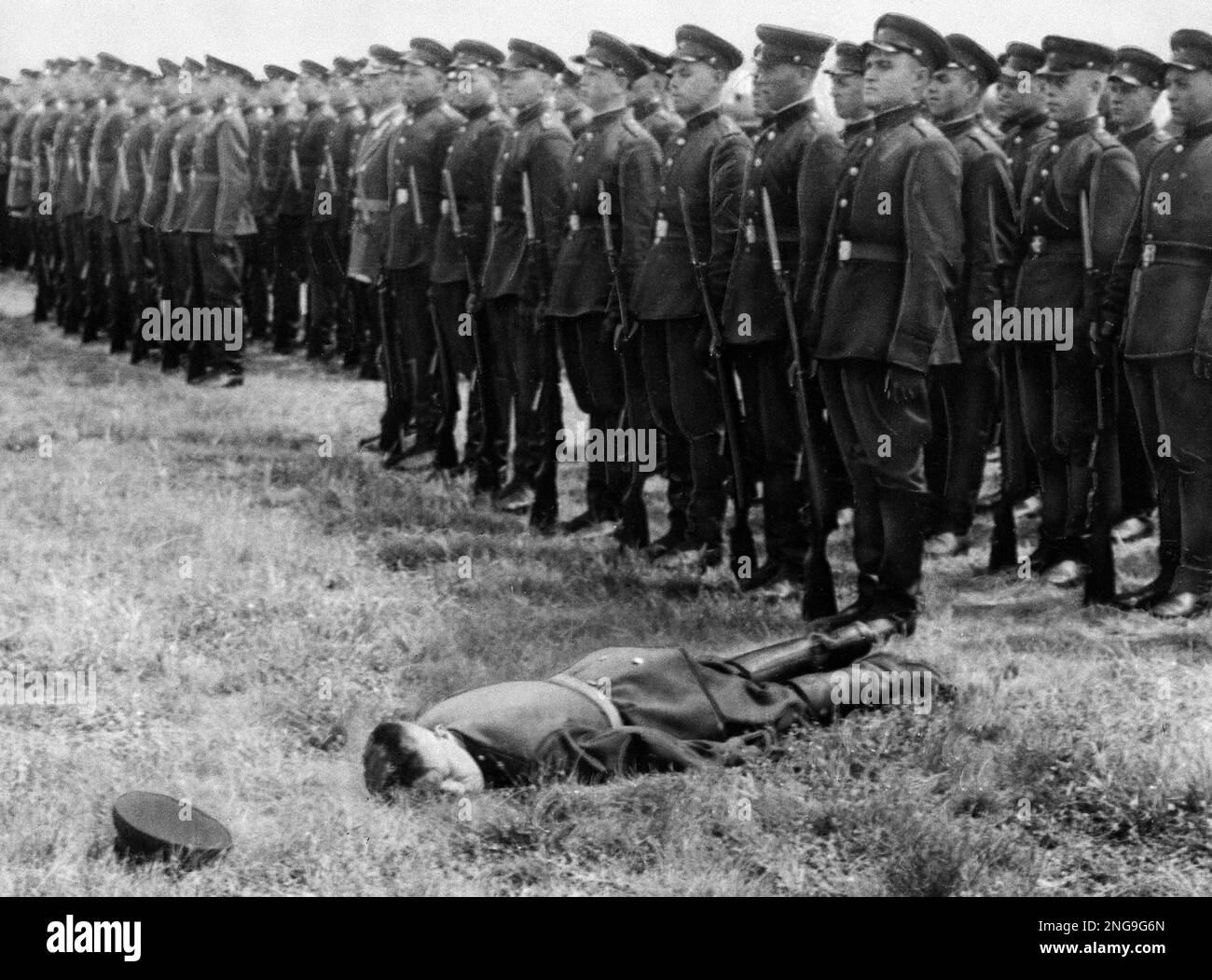 A Soviet soldier is flattened after fainting at a parade of Russian ...
