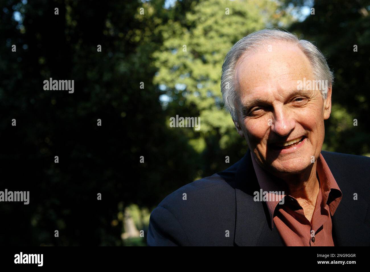 Actor Alan Alda poses in New York's Central Park on Oct. 4, 2005. (AP ...