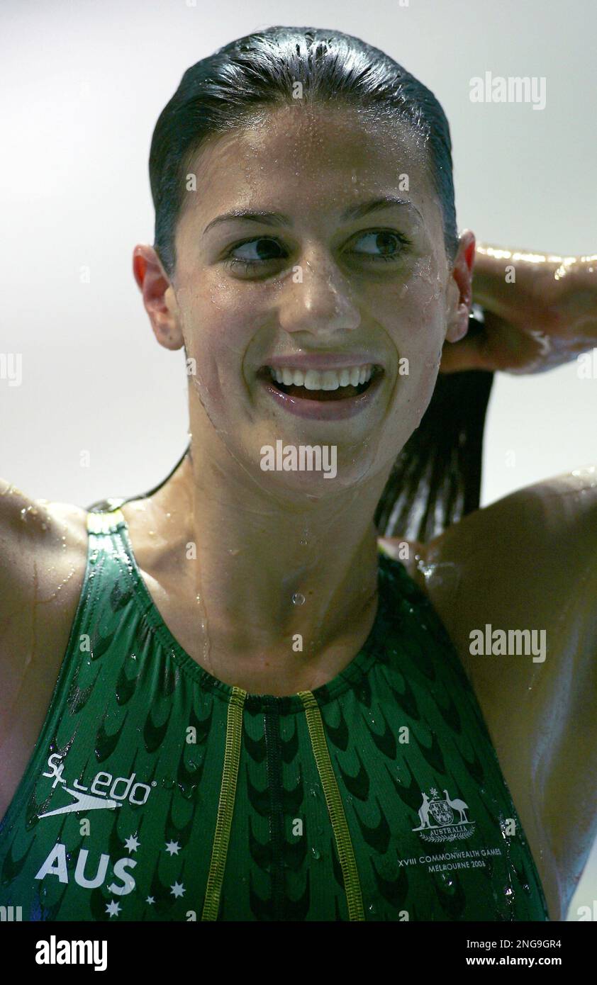Australia's Stephanie Rice smiles as she gets out of the pool after ...