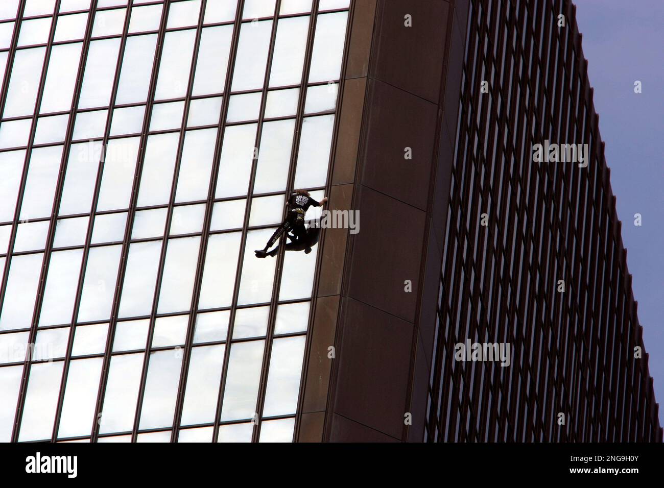 Alain Robert, aka Spiderman, the French skyscraper climber who goes by ...