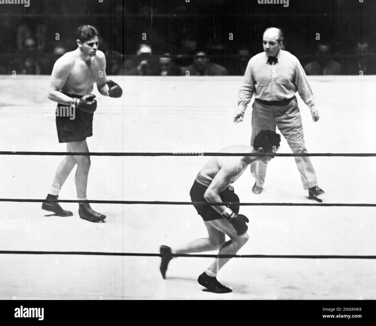 Jack Doyle, foreground, reels around the ring, during a bad moment in ...
