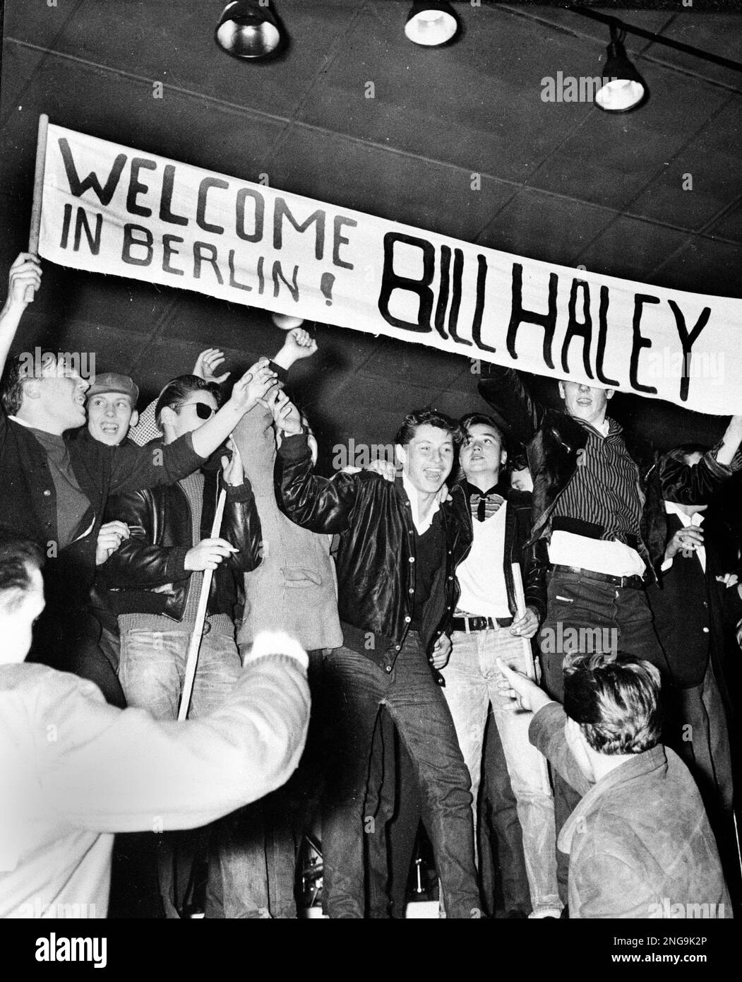 Enthusiastic German youths welcome Bill Haley and the Comets, unseen ...