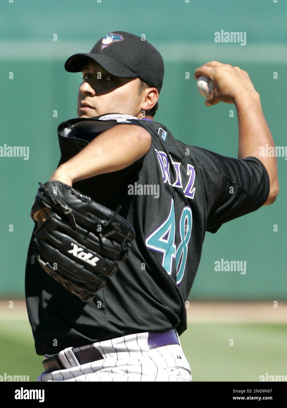 Arizona Diamondbacks pitcher Russ Ortiz warms up on the mound before ...