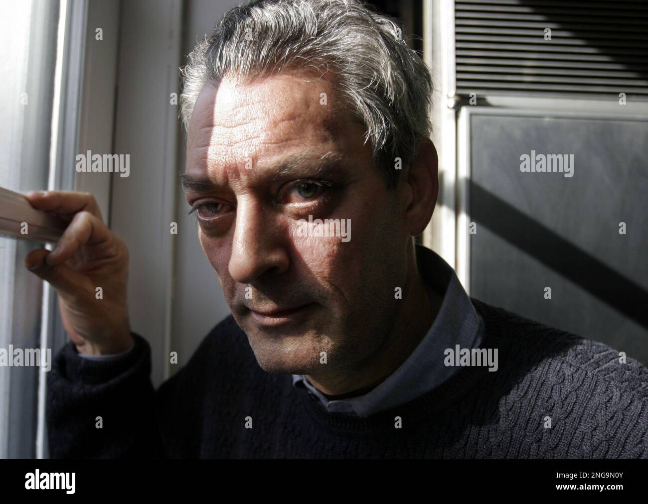 ** ADVANCE FOR WEEKEND EDITIONS, FEB. 23-26 **Writer Paul Auster poses ...