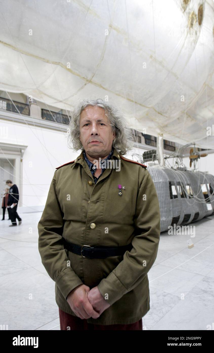 Belgian artist Panamarenko stands in front of one of his artworks ...