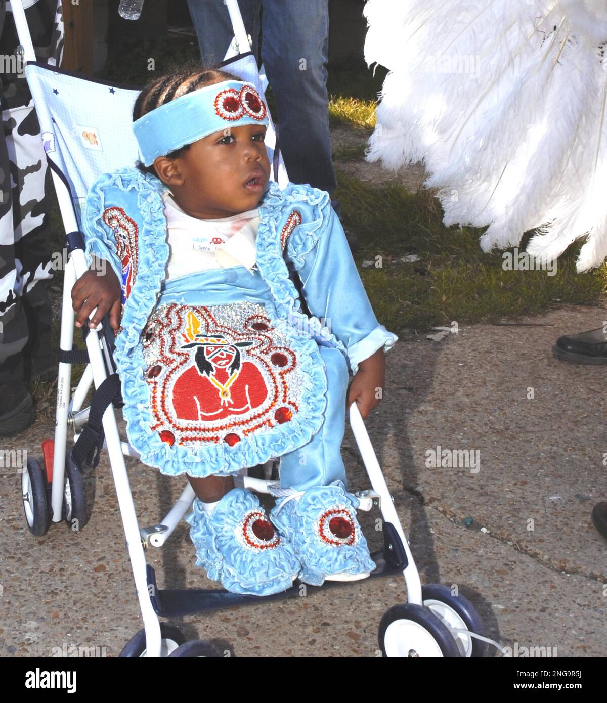 Little Indian Nigel Pleasant, 1, of the Golden Eagles Indian tribe is ...