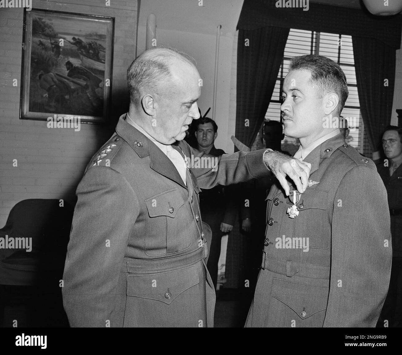 Lt. Col. Gregory (Pappy) Boyington, right, receives the Navy Cross ...