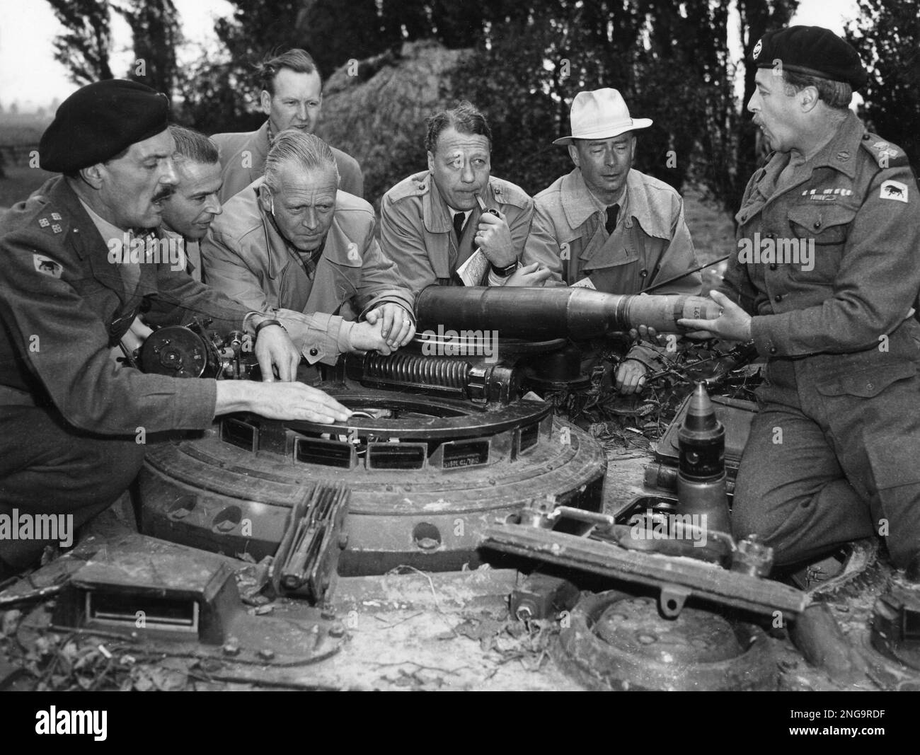 GERMAN MILITARY EXPERTS WATCH ALLIED MANEUVER --- From left to right ...