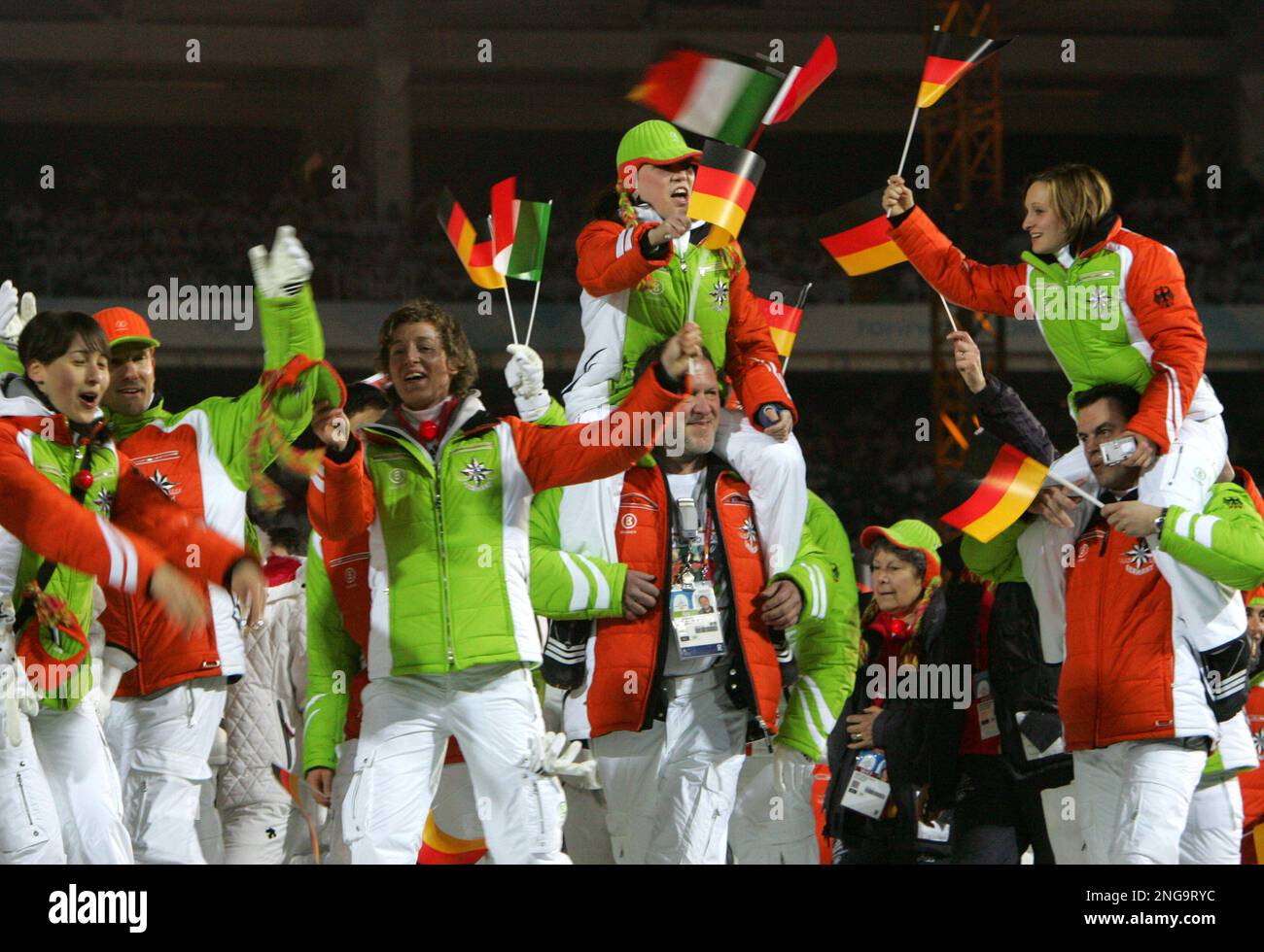 German team members parade during the Winter Olympics closing ceremony ...