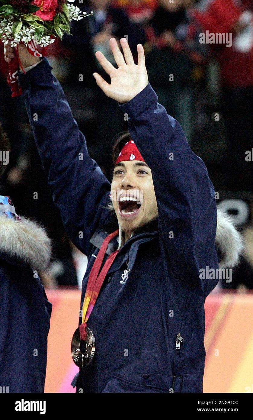 Apolo Anton Ohno of the United States celebrates his bronze medal in ...