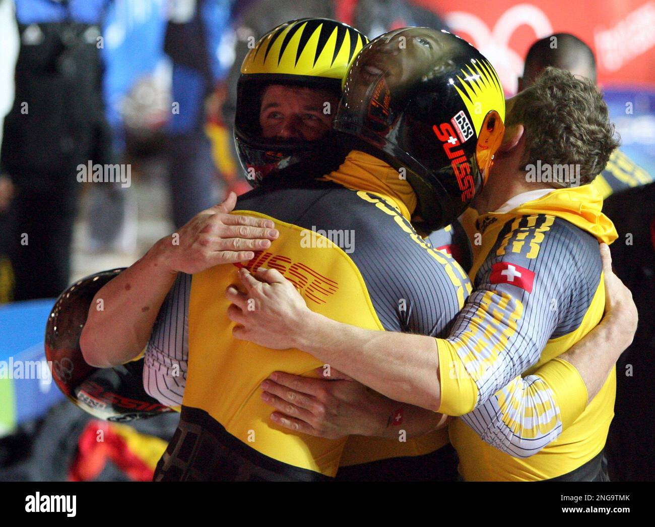 Crew member of bob Switzerland 1 celebrate after the final run of the ...