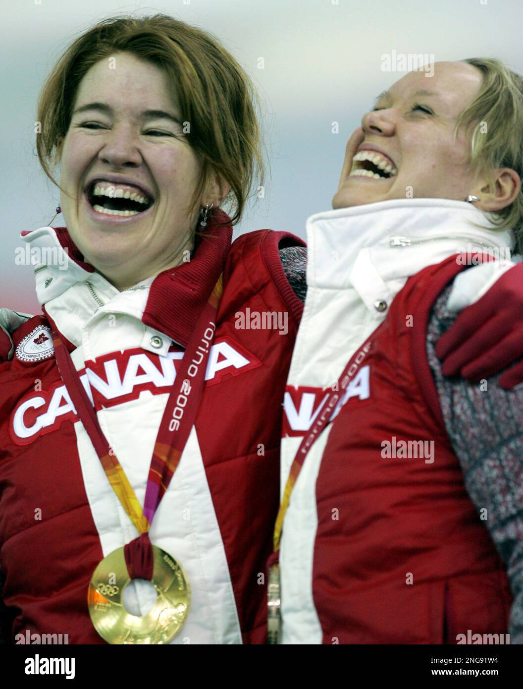 Gold medal winner Canada's Clara Hughes, left, and her compatriot ...